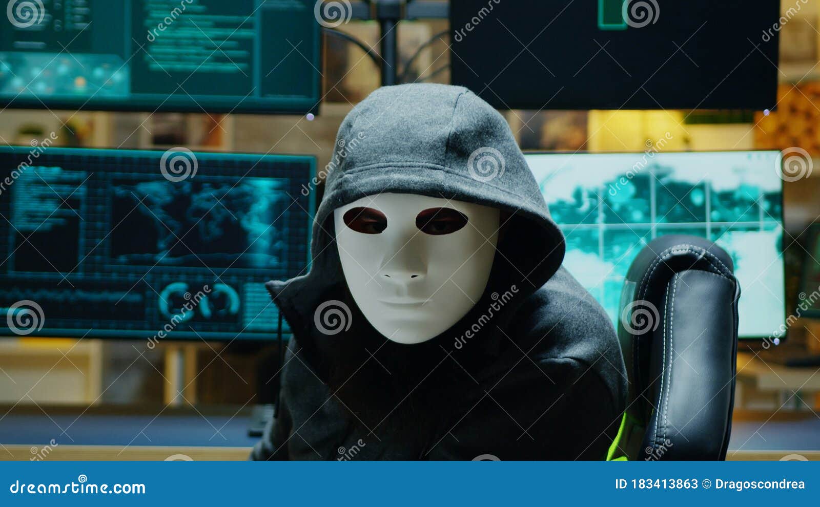 Masked Hacker Wearing A Hoodie To Hide His Identity Royalty-Free Stock ...