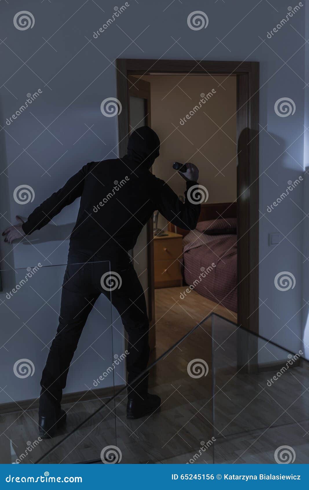 Masked intruder in house stock photo. Image of person - 65245156