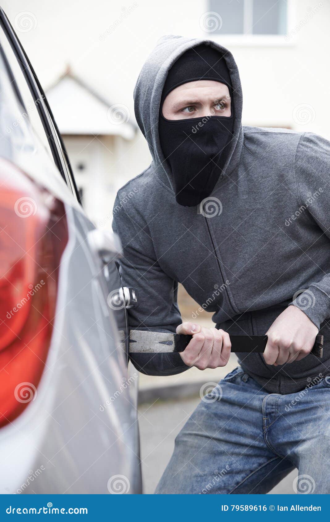 Masked Man Breaking into Car with Crowbar Stock Photo - Image of issue ...