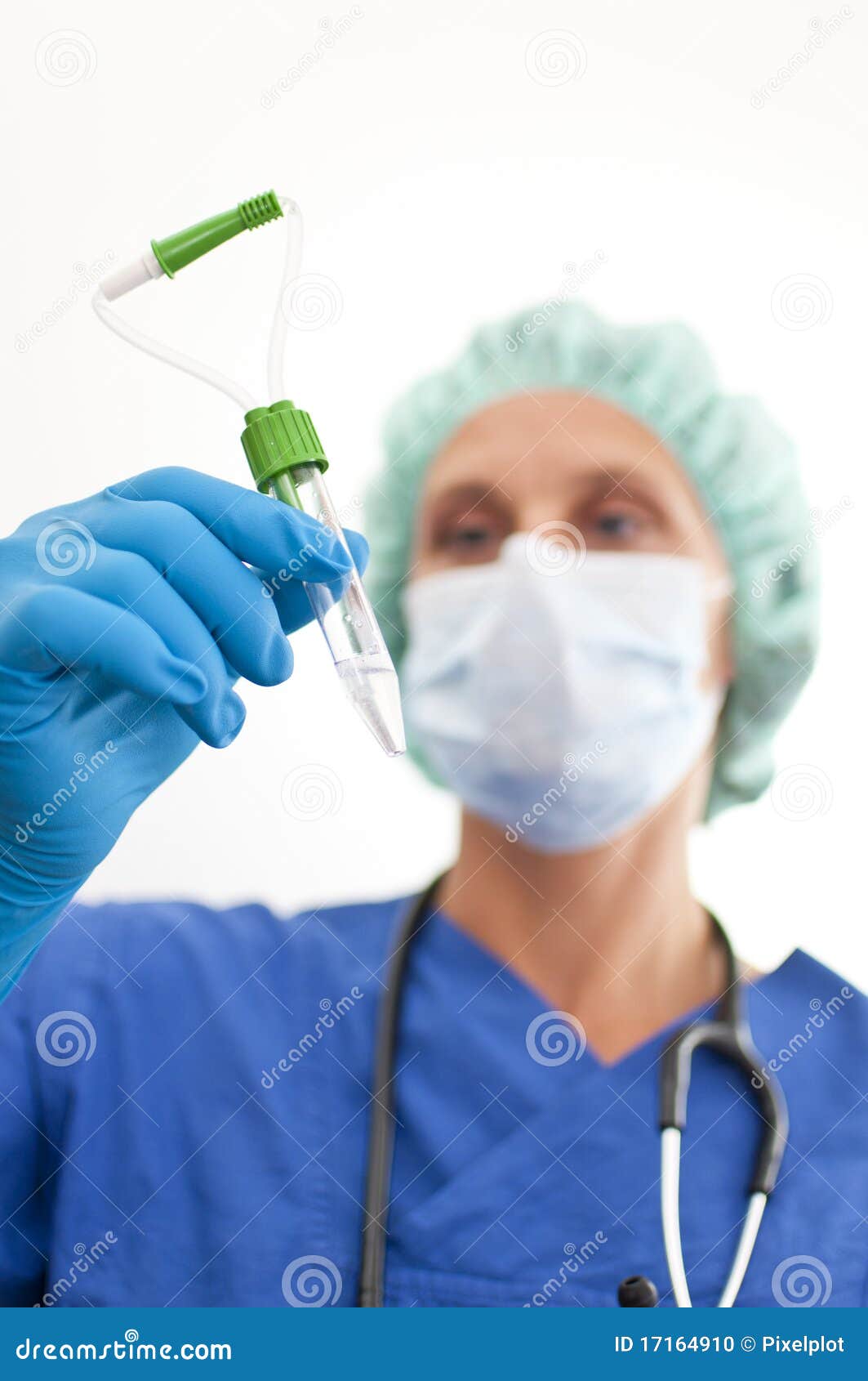 Masked Nurse Asservating Liquid Stock Photo - Image of human, hygiene ...