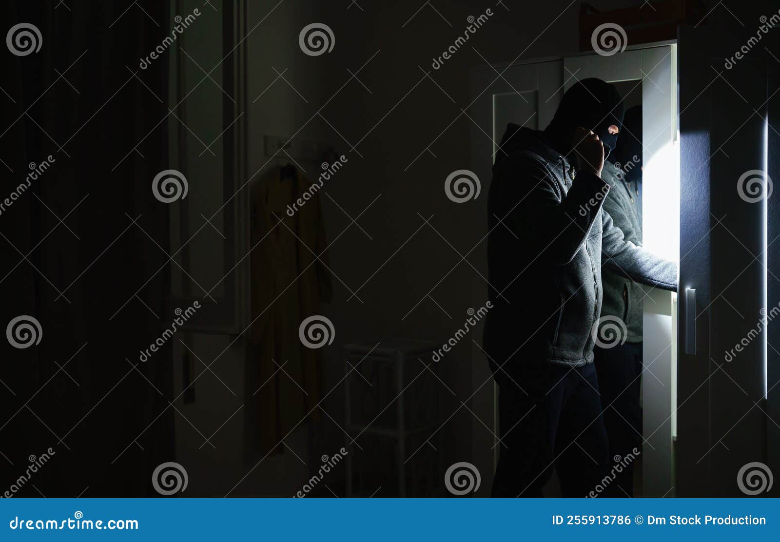Masked Robber with Flashlight Torch Stock Photo - Image of flashlight ...