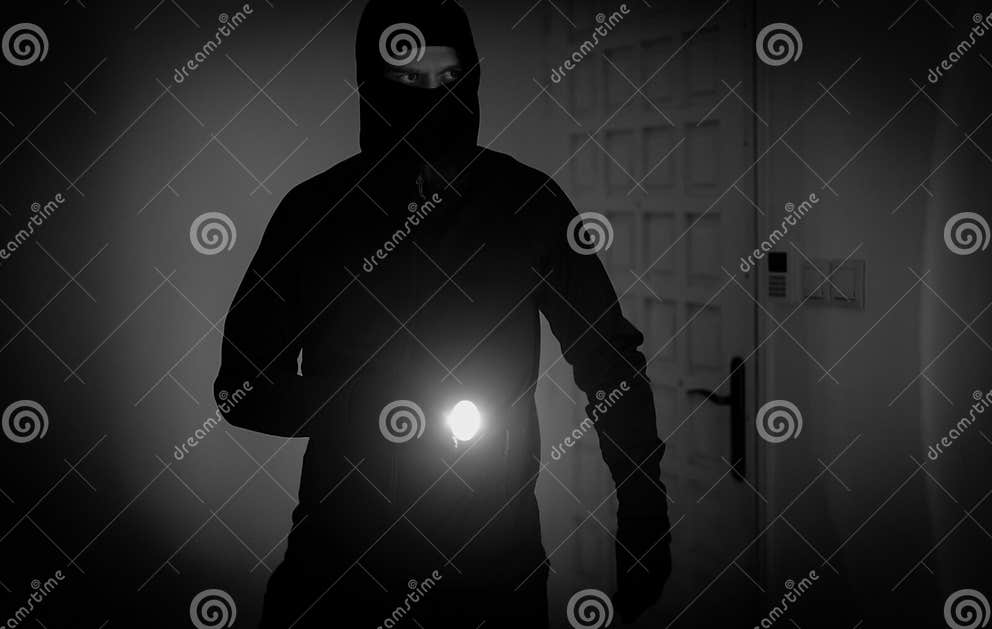 Masked Robber with Flashlight Stock Image - Image of balaclava, danger ...