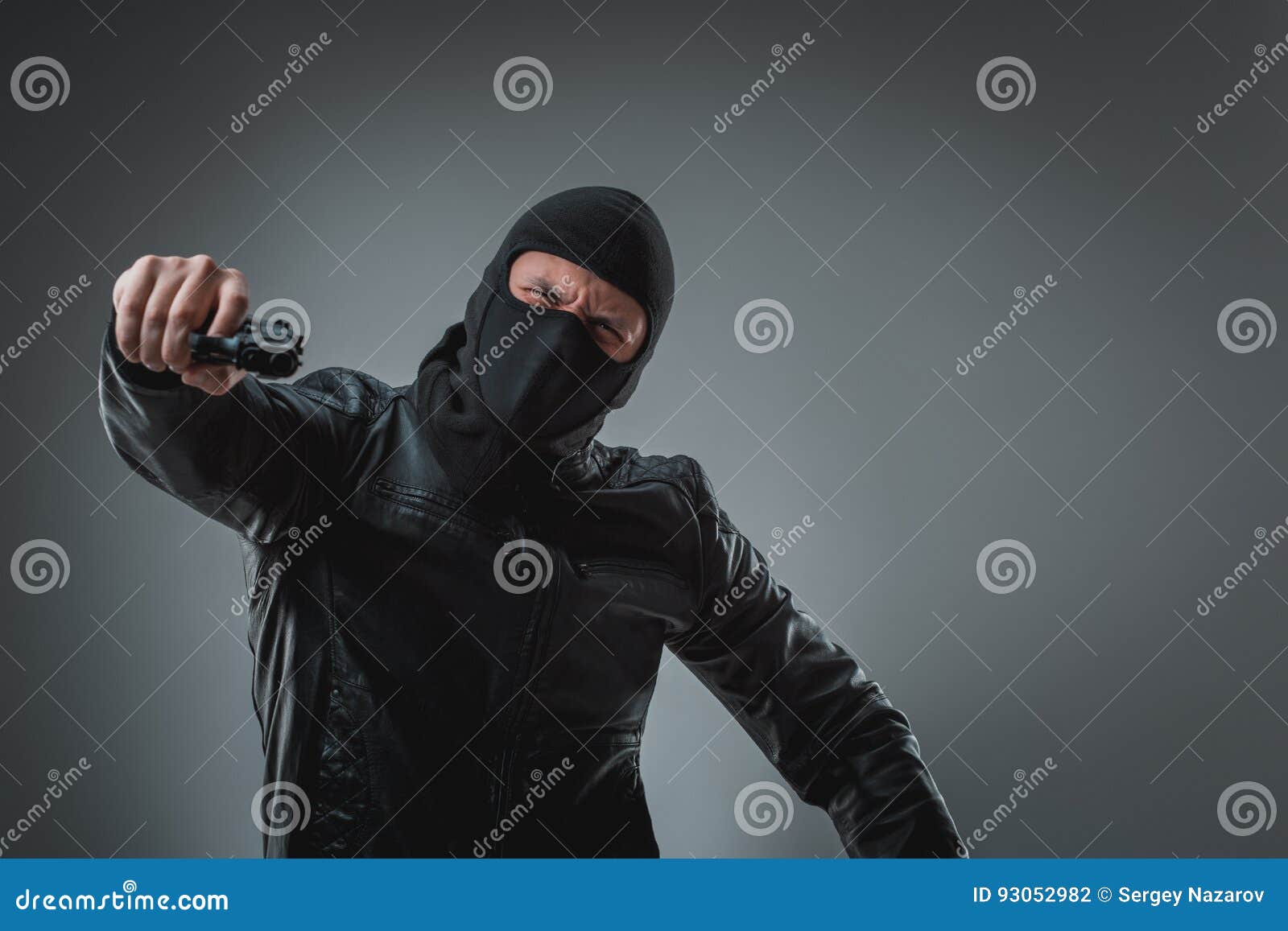 Masked Robber with Gun, Looking into the Camera. Stock Photo - Image of ...