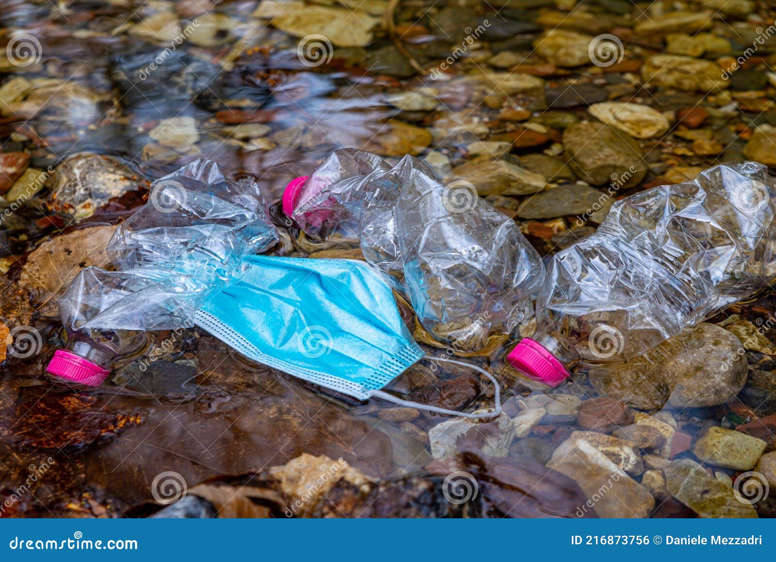 Masks and Plastic Bottles in the Water. Stock Photo - Image of mask ...