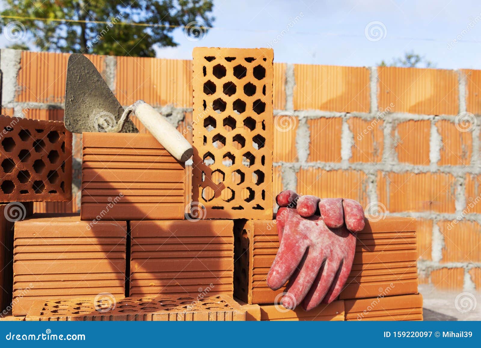 Mason Bricklaying Background with Trowel and Clay Brick Blocks Stock ...