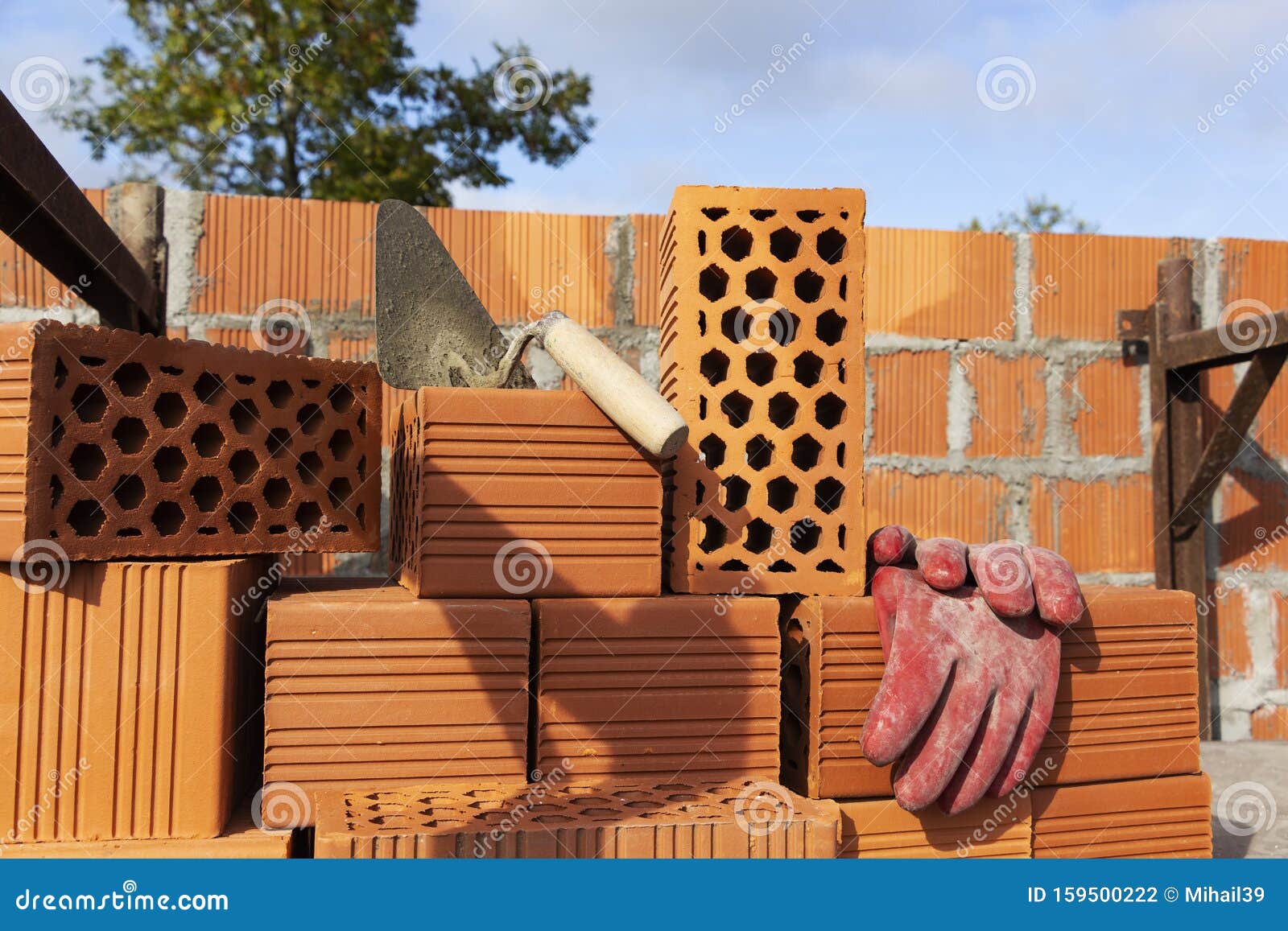 Mason Bricklaying Background with Trowel and Clay Brick Blocks Stock ...