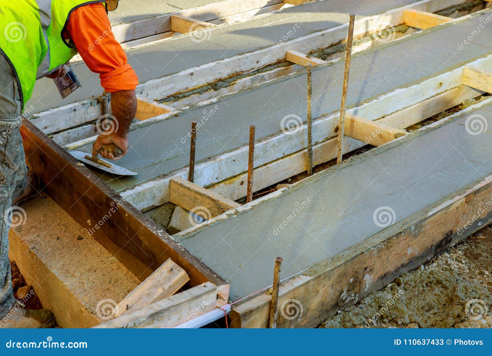 Mason Building A Screed Coat Cement At Floor Work. Pouring Concrete ...