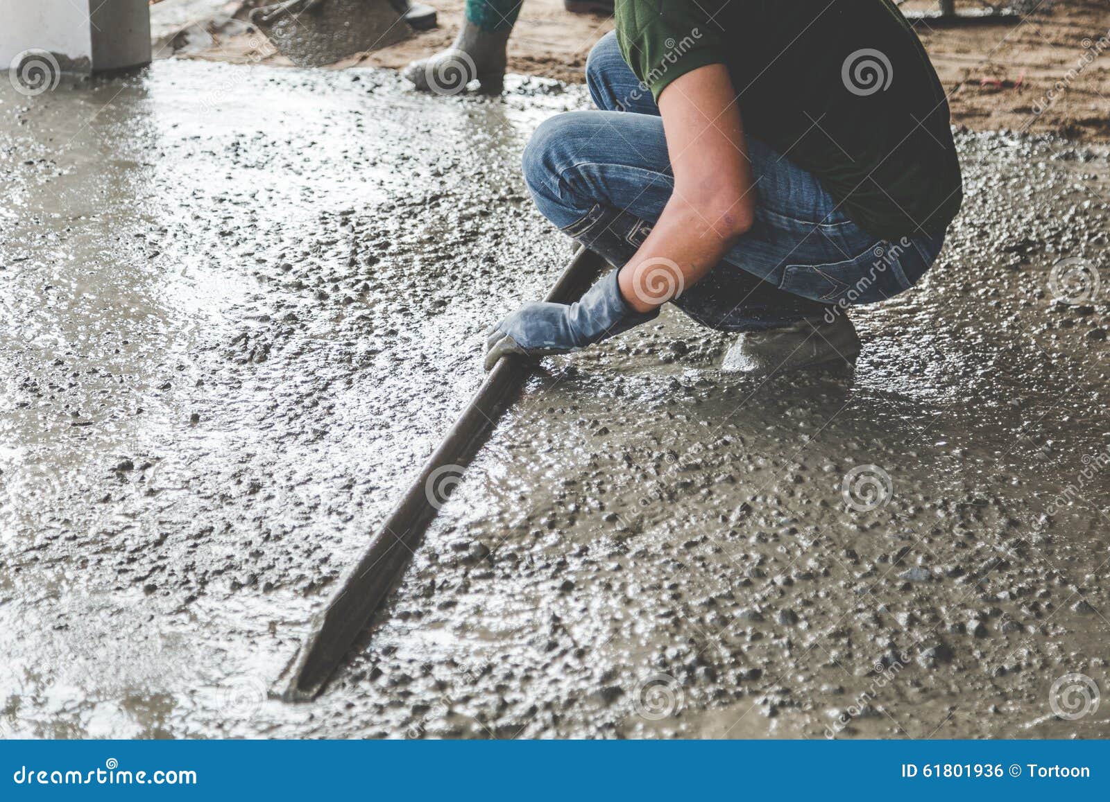 Mason Building And Leveling A First Layer Of Fresh Concrete Floor At ...