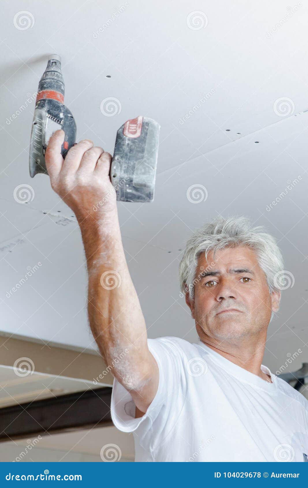 Mason Drilling into Ceiling Stock Photo - Image of male, expertise ...