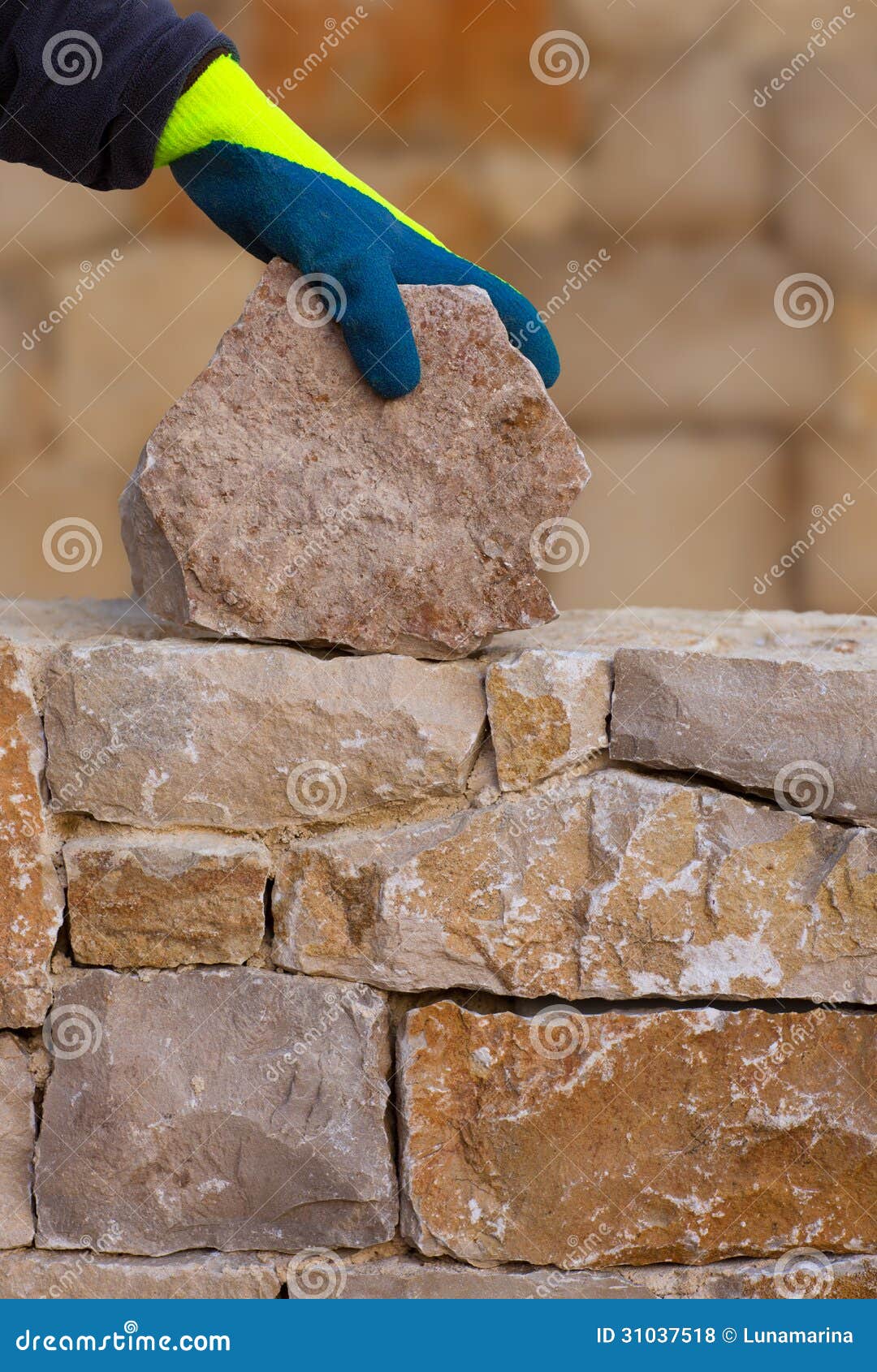 Mason Hands Working on Masonry Stone Wall Stock Photo - Image of ...
