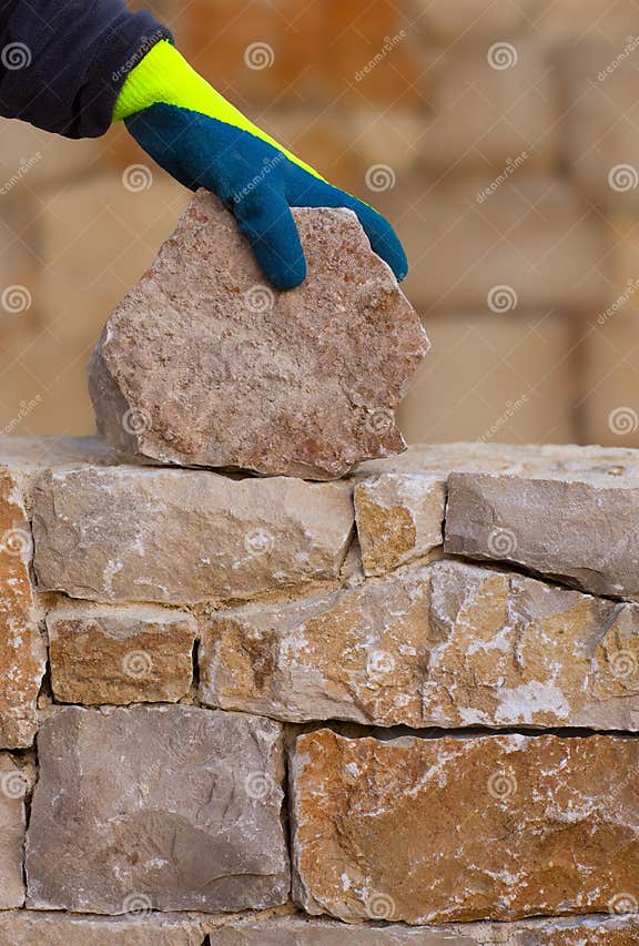 Mason Hands Working on Masonry Stone Wall Stock Photo - Image of ...
