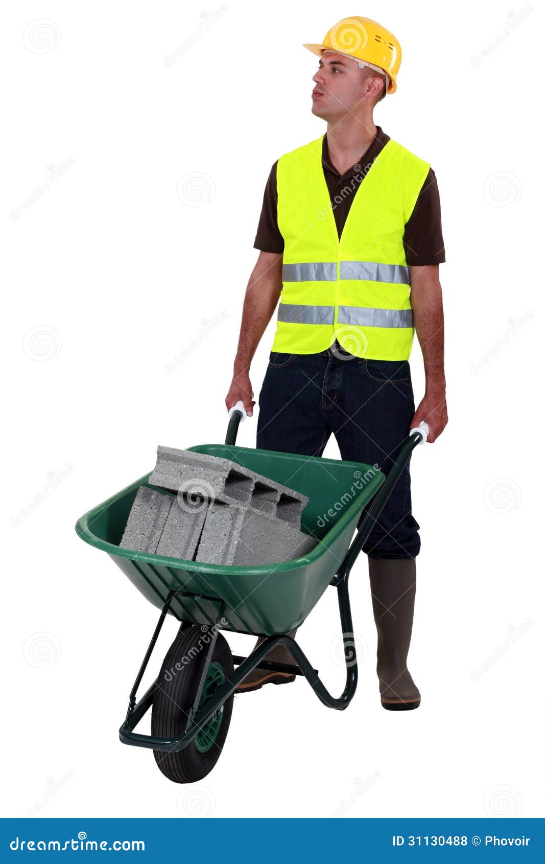 Mason pushing wheelbarrow stock photo. Image of wall - 31130488