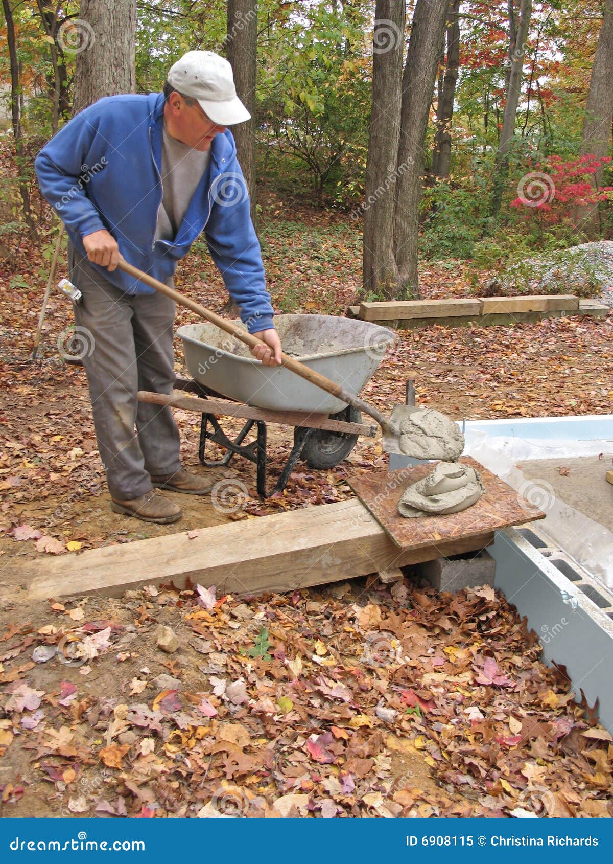 Mason Shoveling Mortar Onto Board Stock Image - Image of layer ...