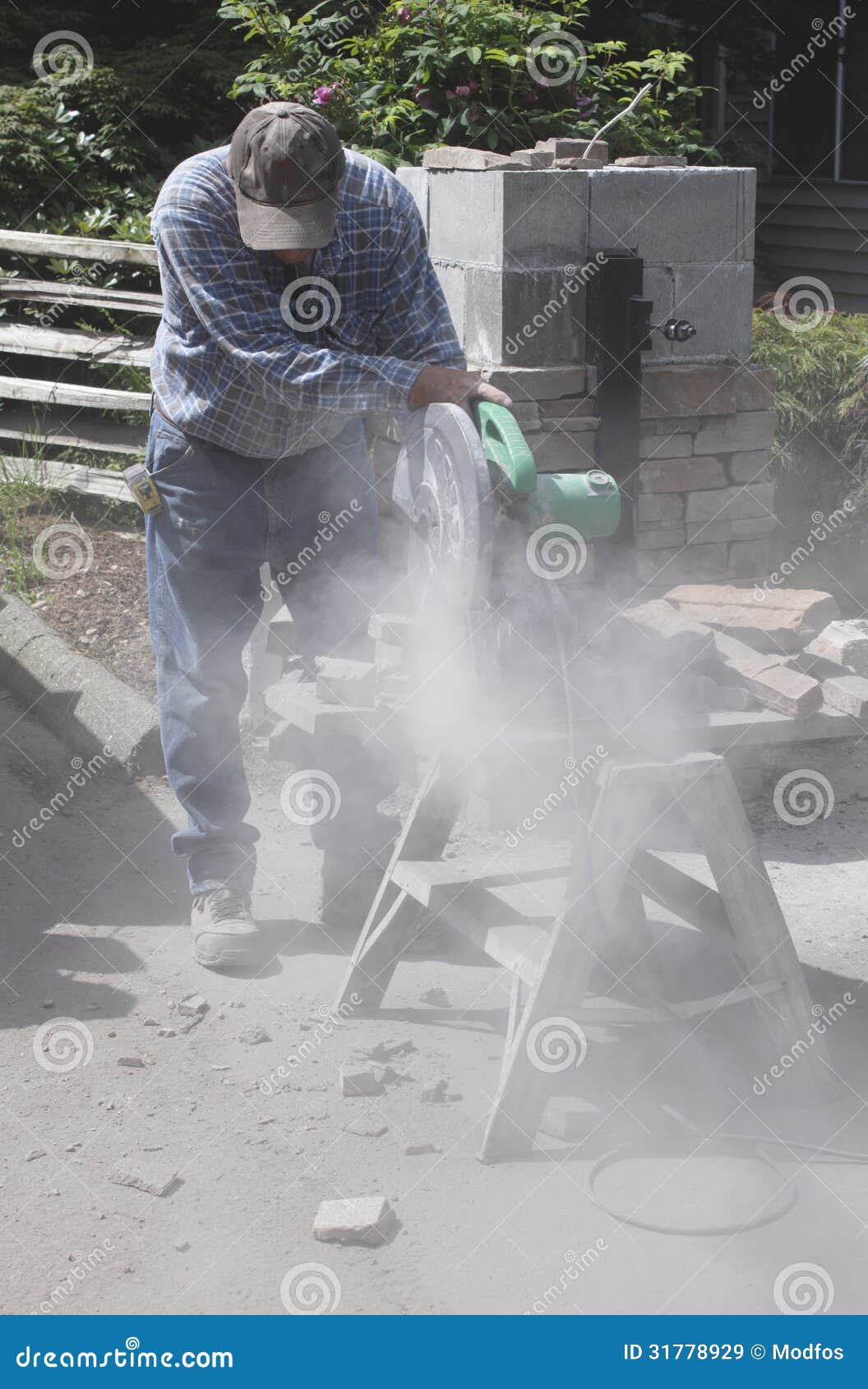 Mason Using Brick Cutter stock image. Image of craftsman - 31778929