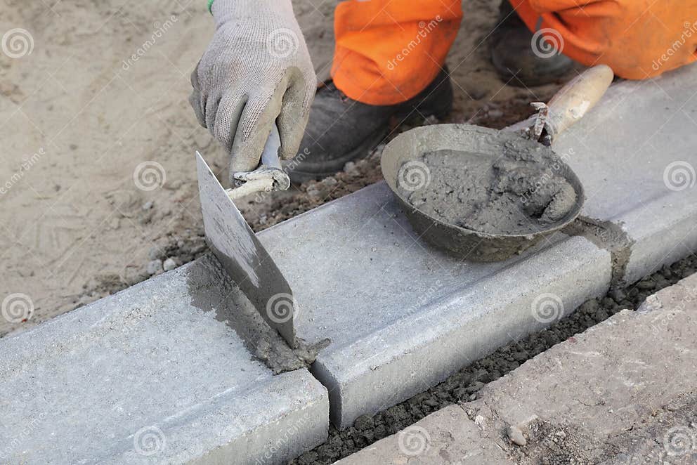 Mason using trowel stock image. Image of pavement, gloves - 39012131