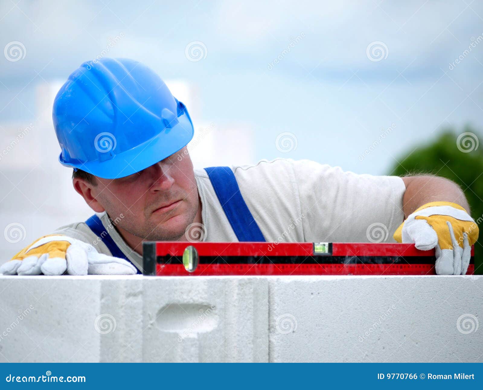 Mason at work stock photo. Image of block, personnel, blue - 9770766