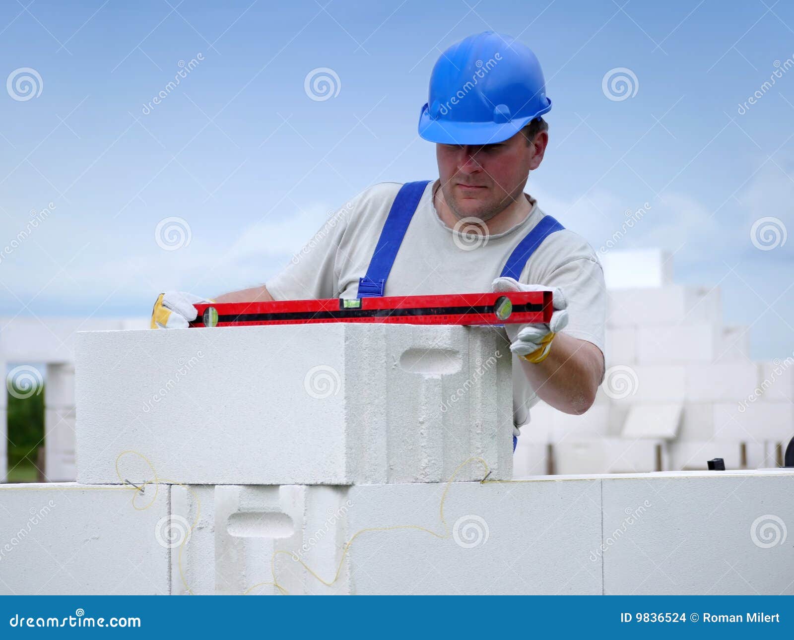 Mason at work stock photo. Image of aligning, mason, checking - 9836524