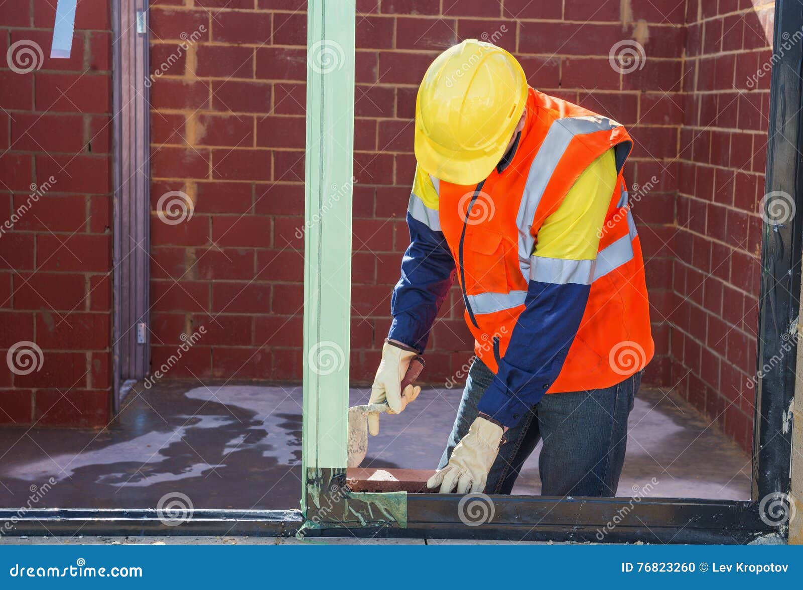 Mason Worker on Construction Site Stock Photo - Image of wall, control ...