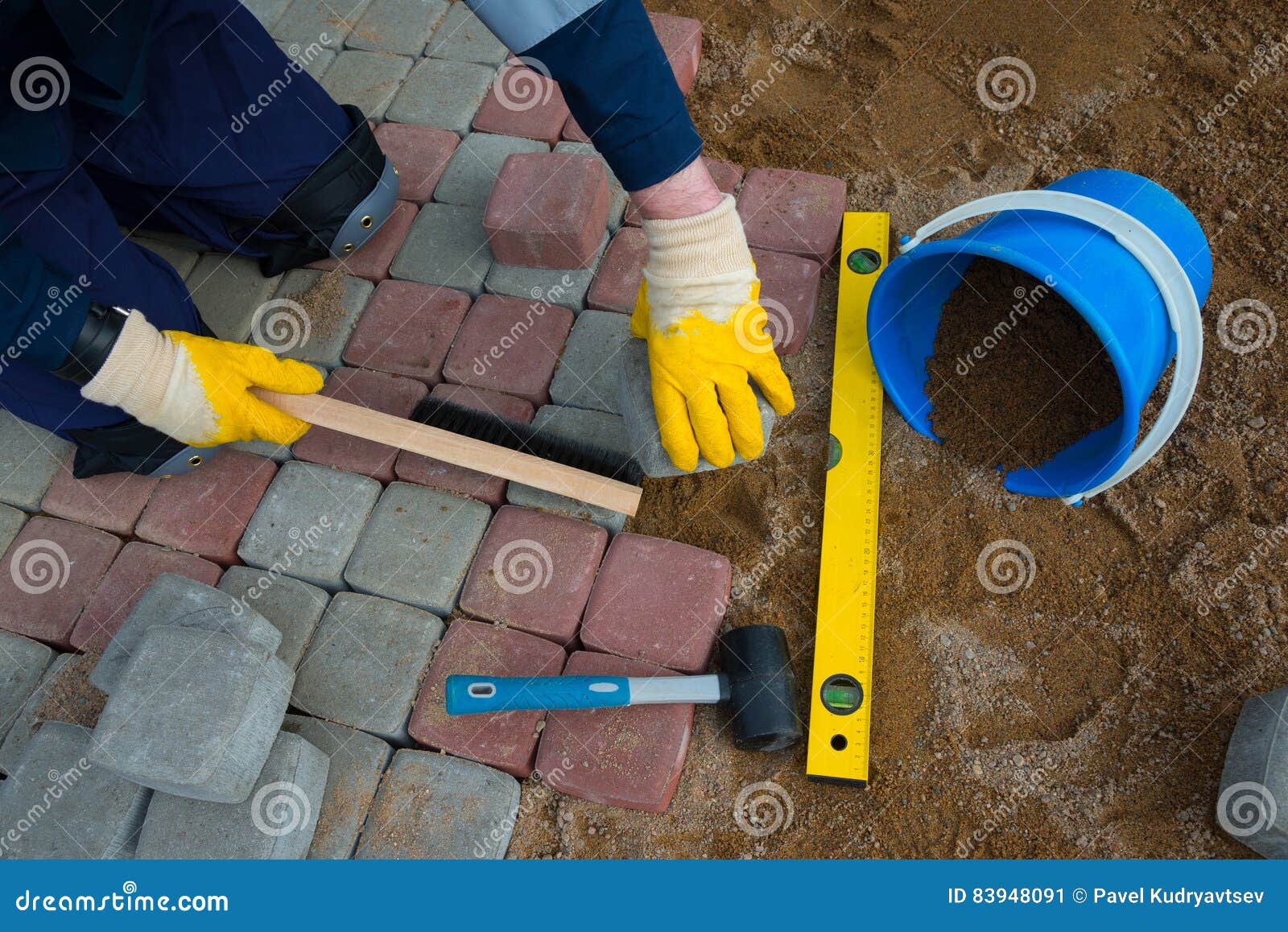 Mason Worker Making Sidewalk Pavement with Stock Image - Image of ...