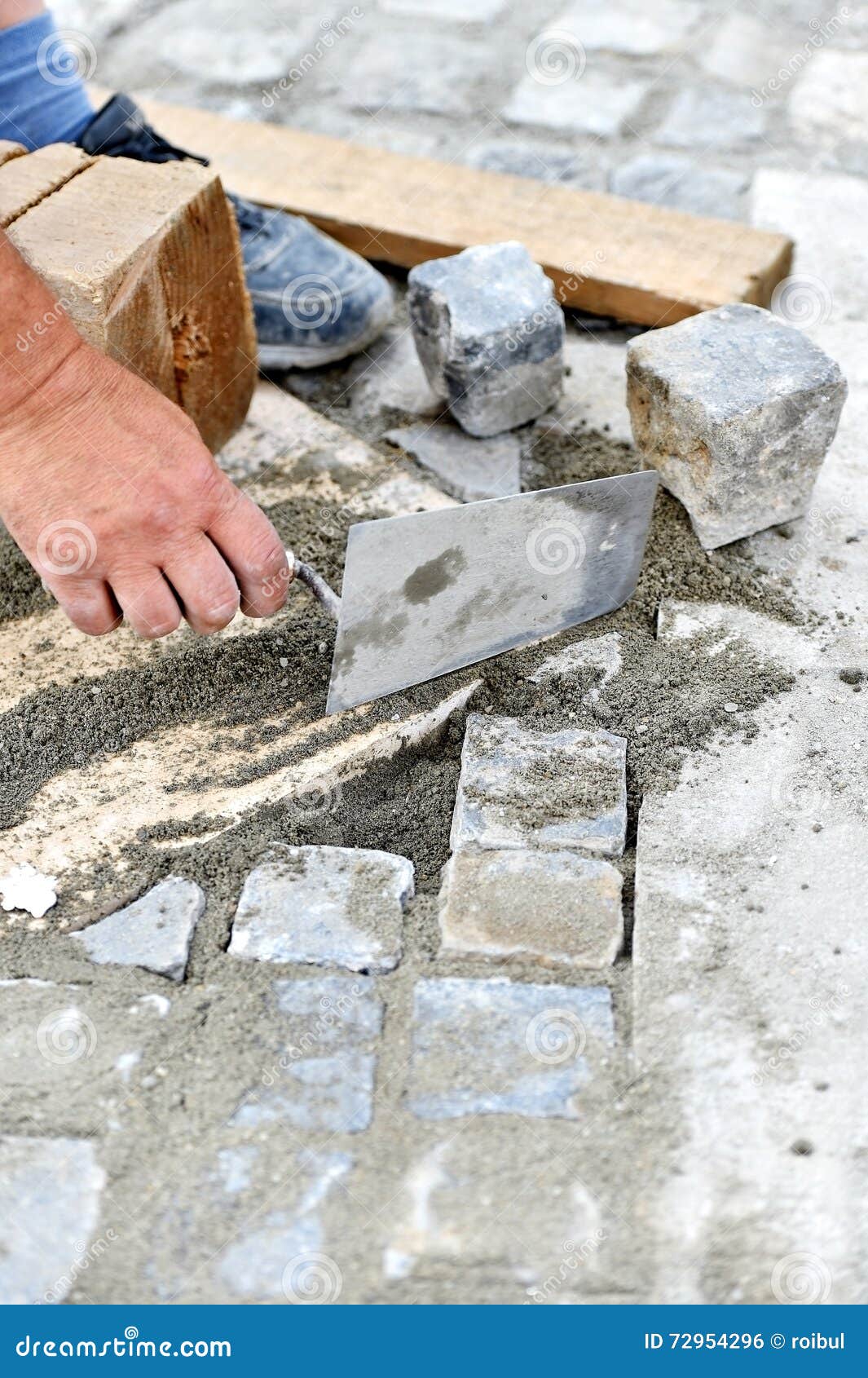 Mason Working with Cobblestone Stock Photo - Image of builder ...