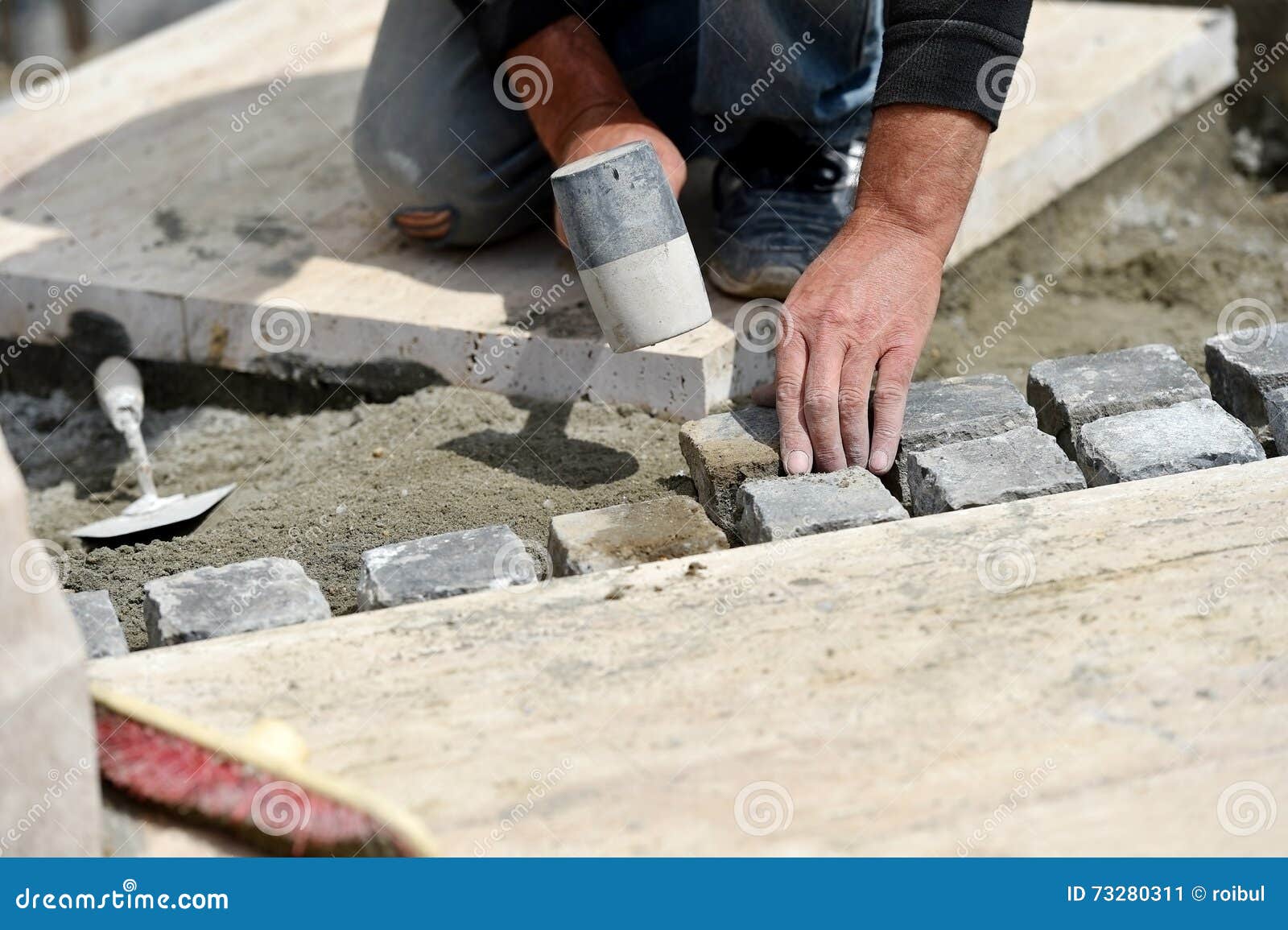Mason Working with Cobblestone Stock Image - Image of laying, pebble ...