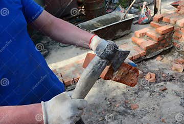 Masonry. How To Hand Cut a Brick Stock Image - Image of site, mason ...