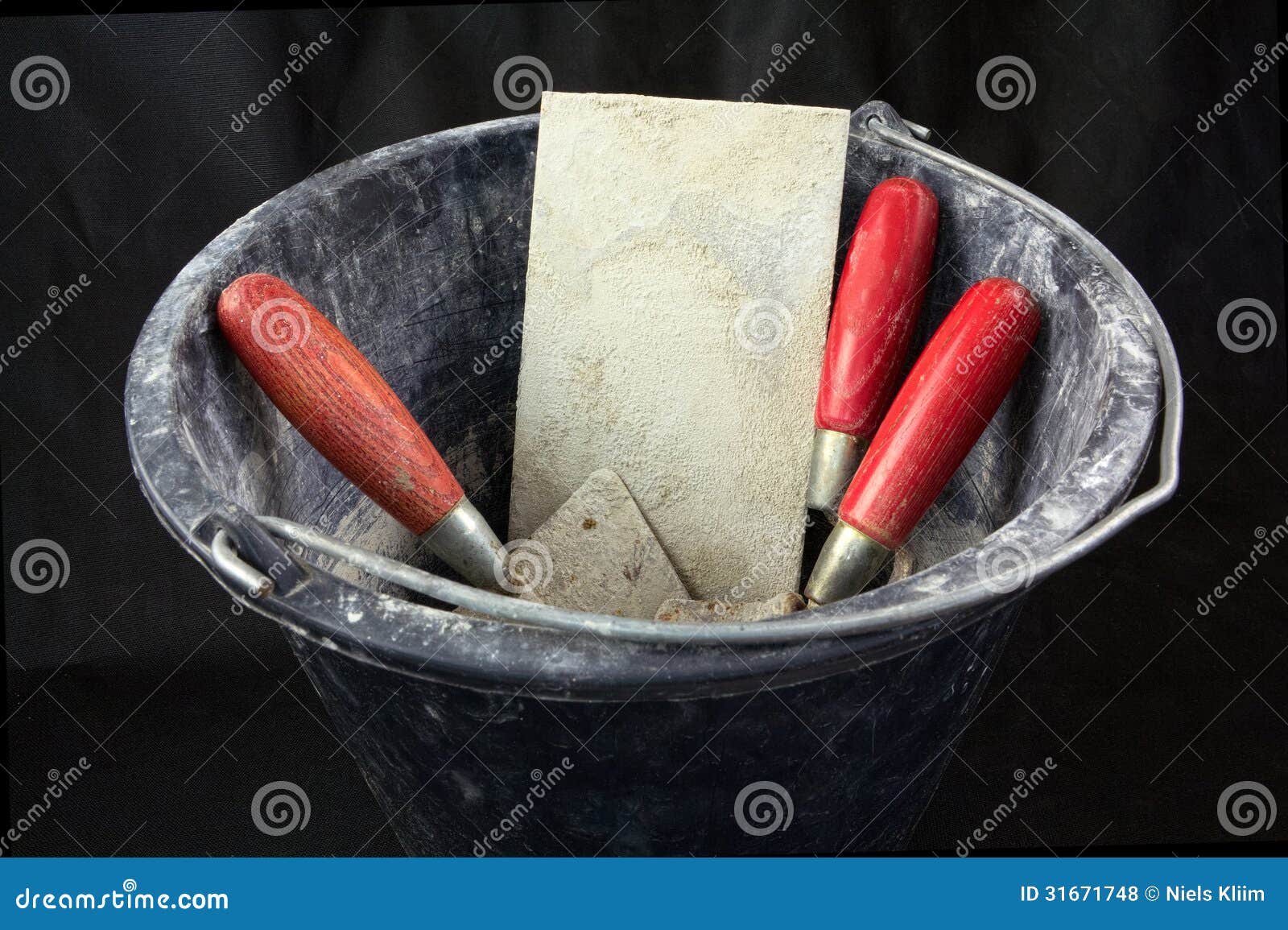 Masonry tools in a bucket stock photo. Image of mason - 31671748