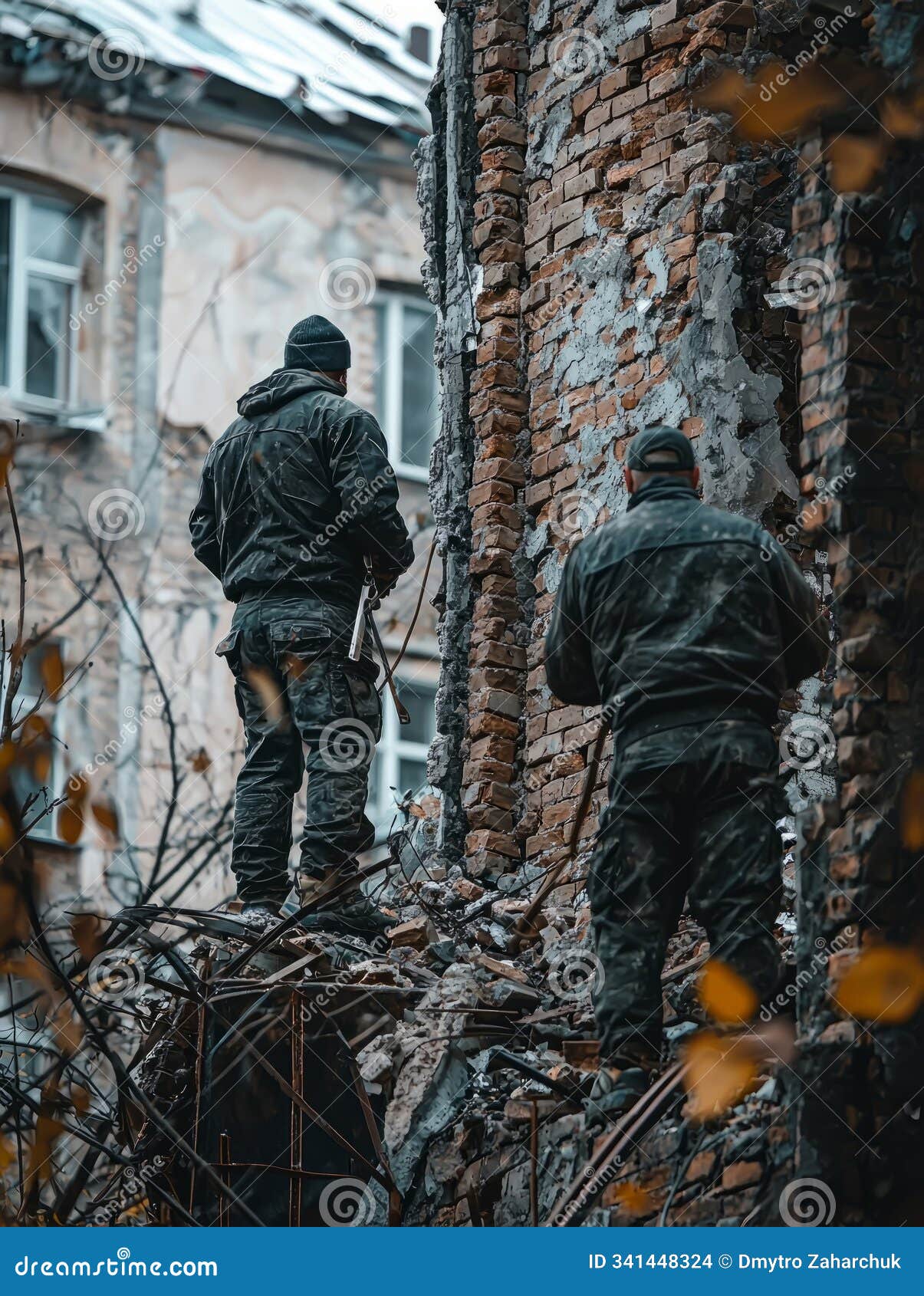Masonry Workers Rebuilding a Brick Wall that Collapsed after a N Stock ...