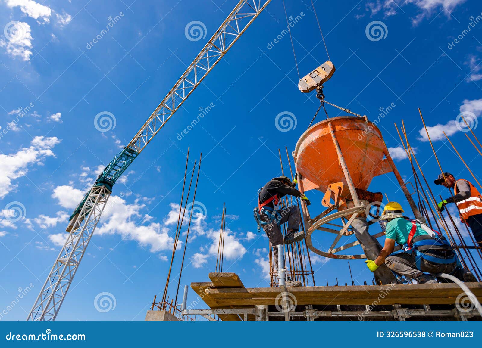 Masons Fill Up Vertical Mold with Help of Crane As Carry Cone Tank for ...