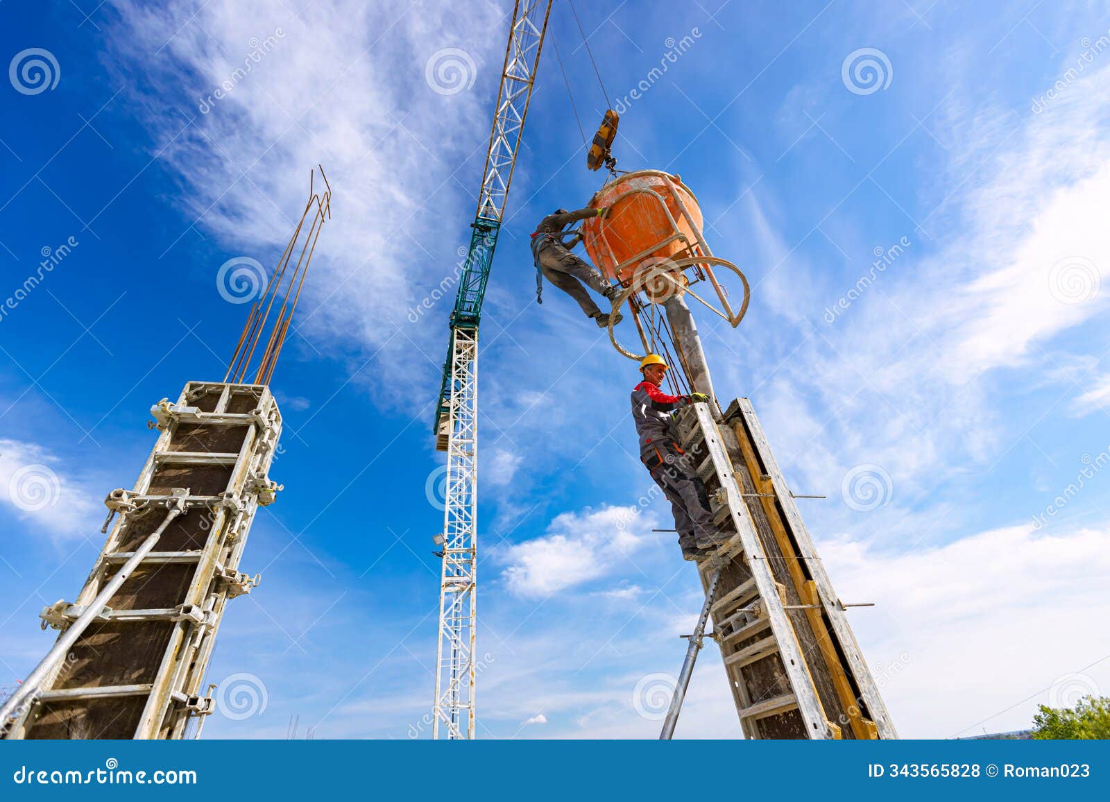 Masons Fill Up Vertical Mold with Help of Crane As Carry Cone Tank for ...