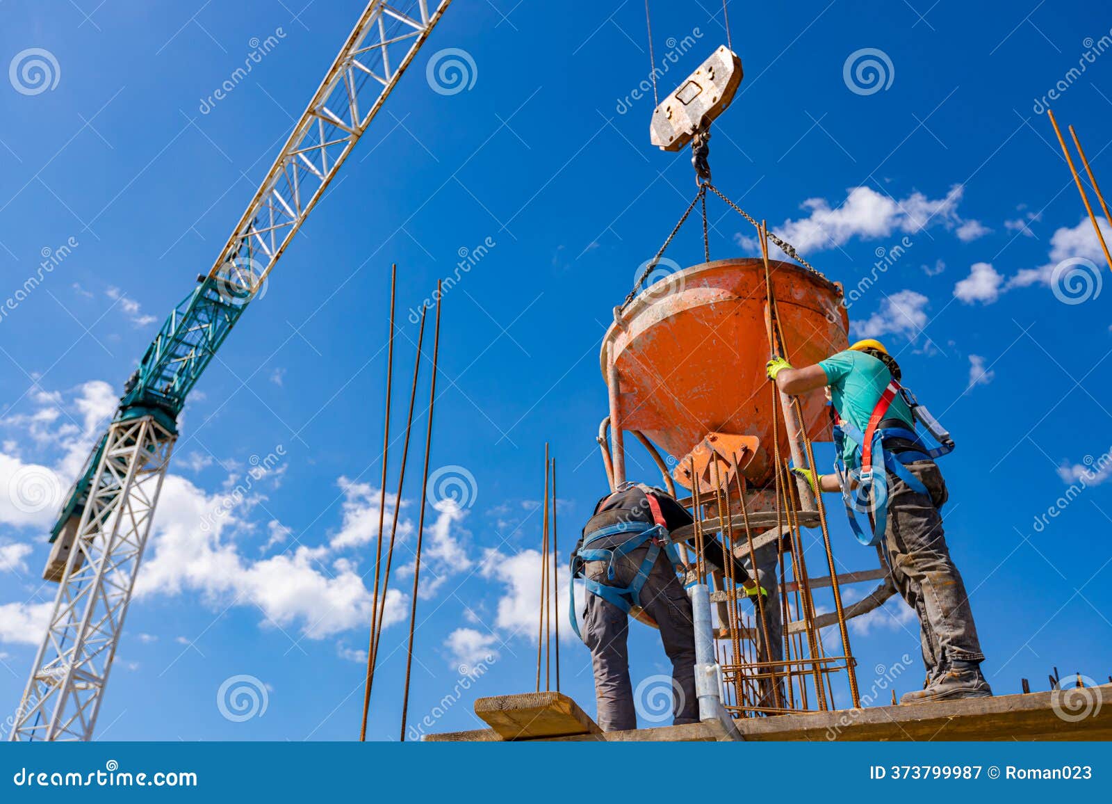 Masons Fill Up Vertical Mold With Help Of Crane As Carry Cone Tank For ...