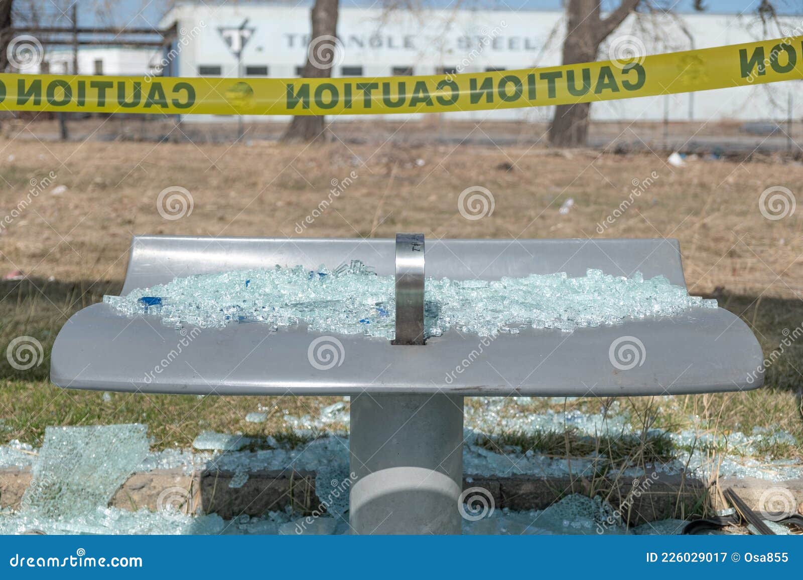 Mass Transit Bus Stop with Smashed Glass on Chair Stock Image - Image ...