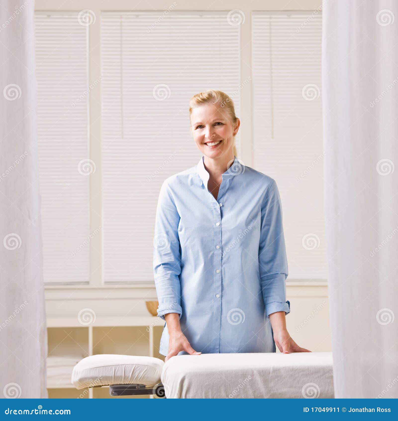 Massage Therapist Next To Massage Table Stock Image - Image of resort ...