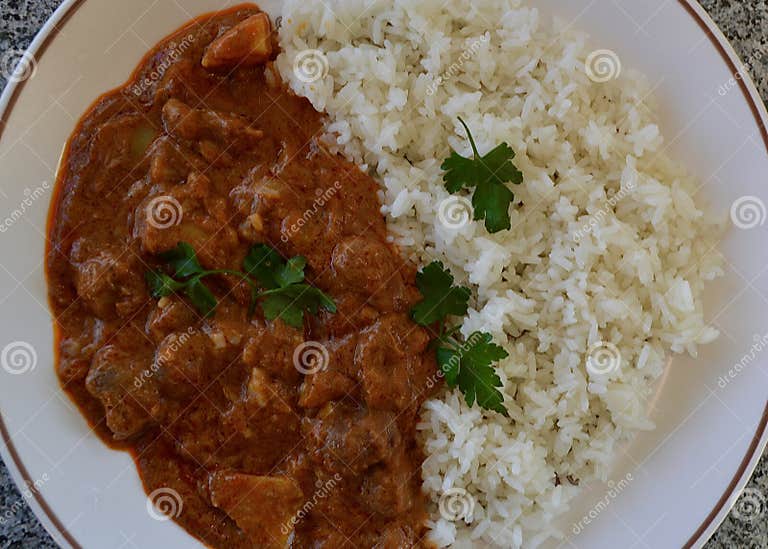 Massaman Curry and White Rice Stock Image - Image of paste, person ...