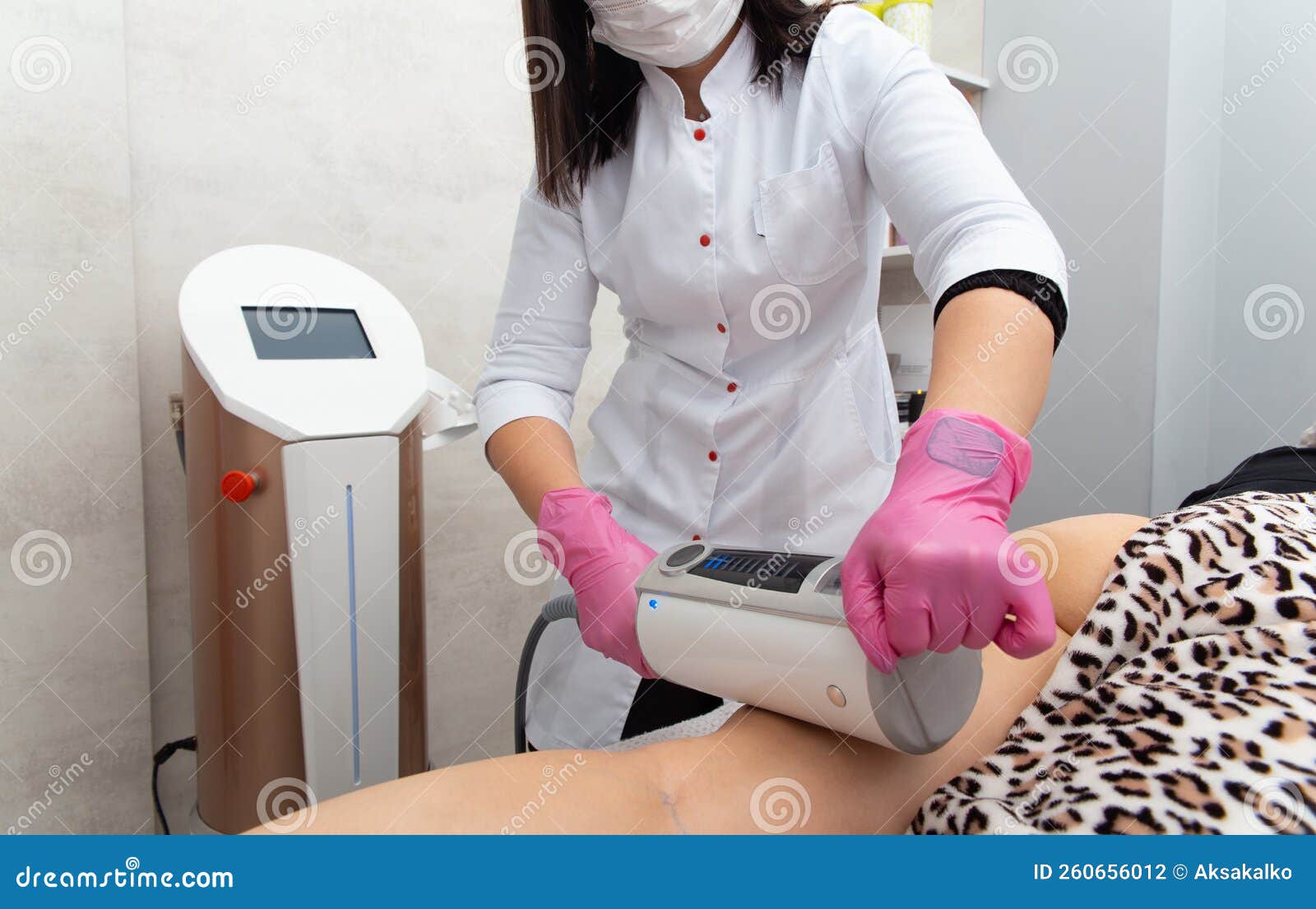The Masseur Does A Massage Using Anti Cellulite Massage Machine With