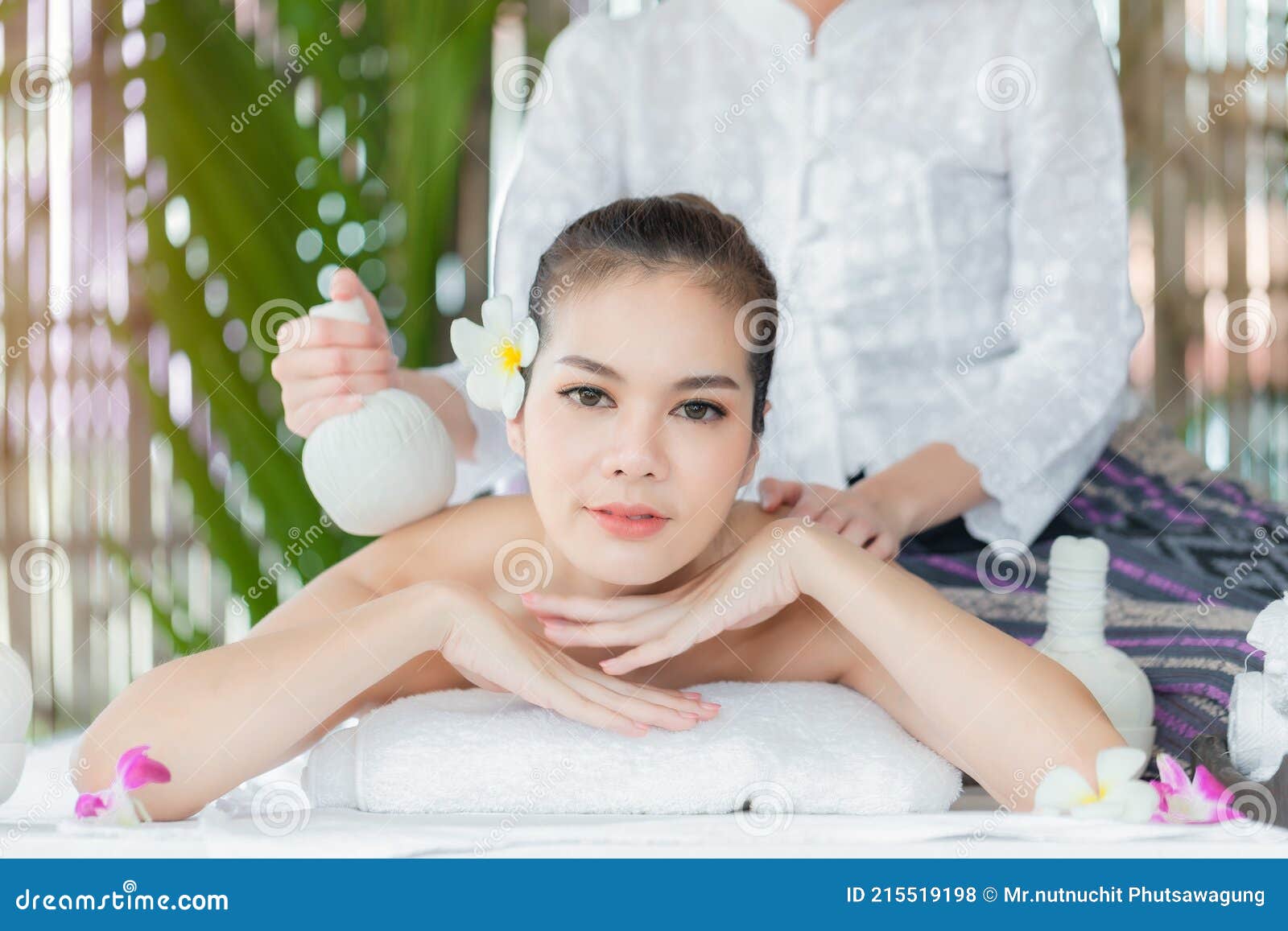 Masseur Doing Massage On Woman Body In The Spa Salon Asian Woman On
