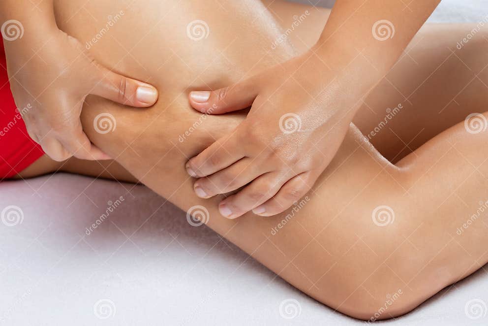 Masseur Makes Anti Cellulite Massage On The Legs Thighs Hips And Buttocks In The Spa