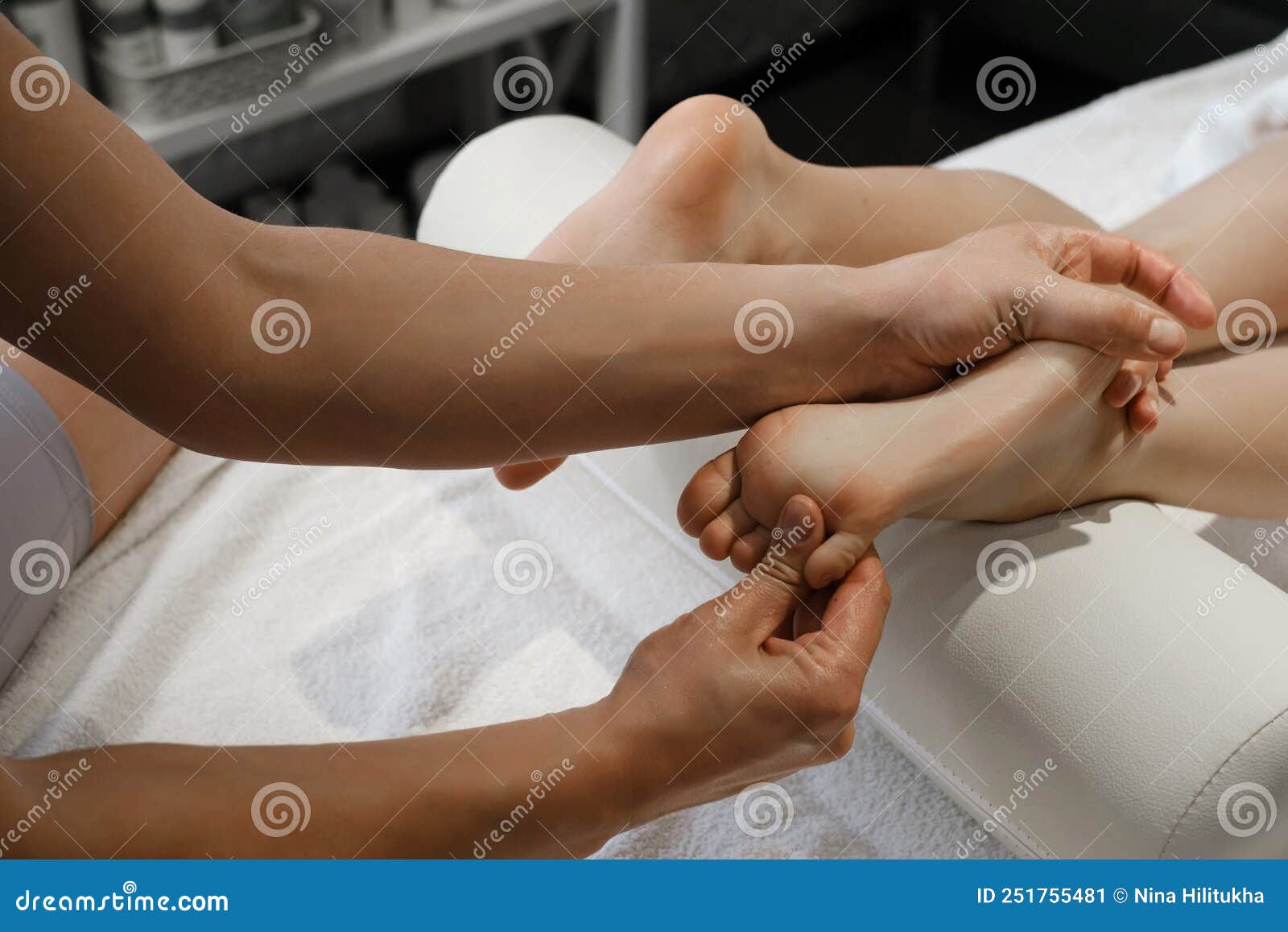 Massage And Rehabilitation Massage Therapist Massaging A Patients Calf