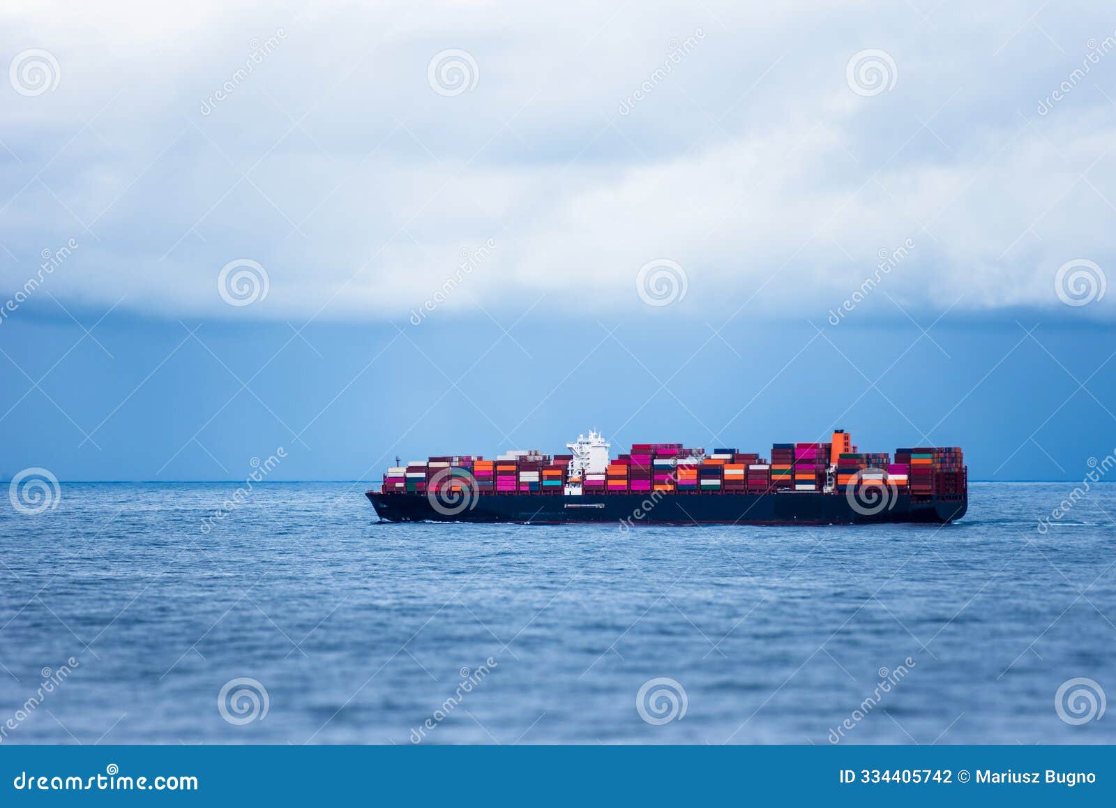 A Massive Container Ship, Fully Loaded with Colorful Cargo. Editorial ...