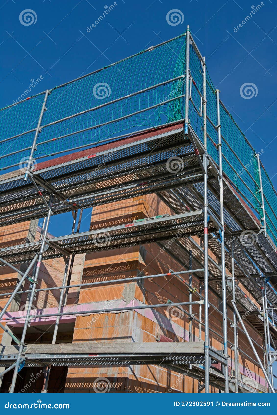 Massive Home in Shell Construction with Scaffolding, Portrait Format ...