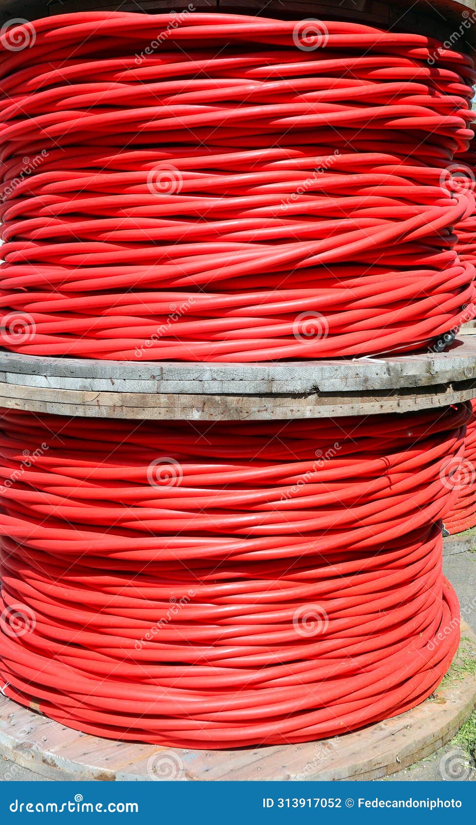Massive Reels of Thick Red Electrical Power Cable for Transporting High ...