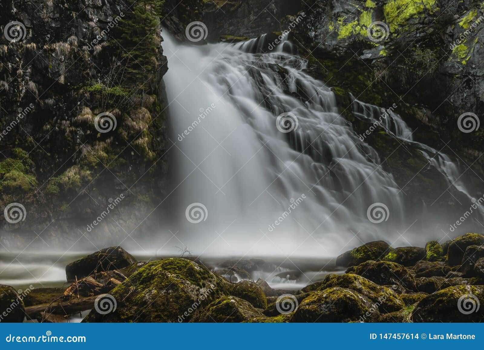 Massive Waterfall with Rocks in the Front Stock Photo - Image of ...