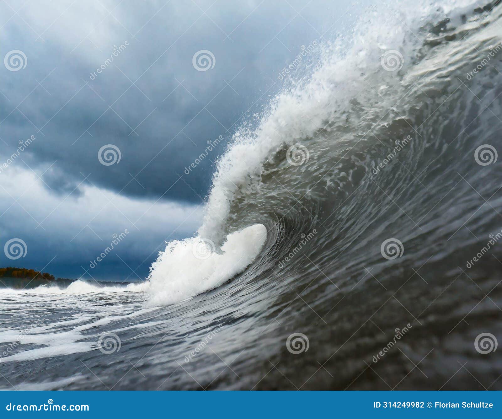 A Massive Wave Crashes in the Water on a Cloudy Day, Stirred Up by the ...