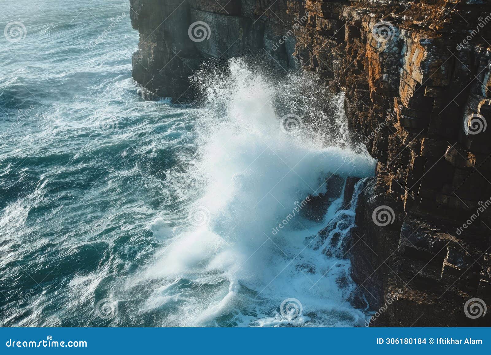 A Massive Wave Forcefully Collides with the Side of a Steep Cliff ...