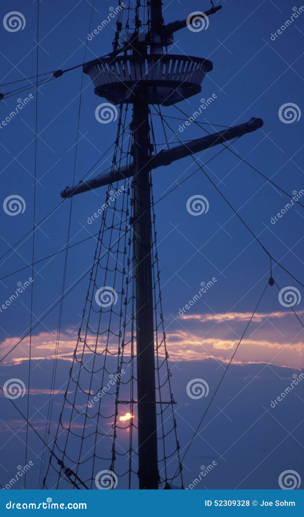 Mast of a schooner at dusk stock photo. Image of history - 52309328