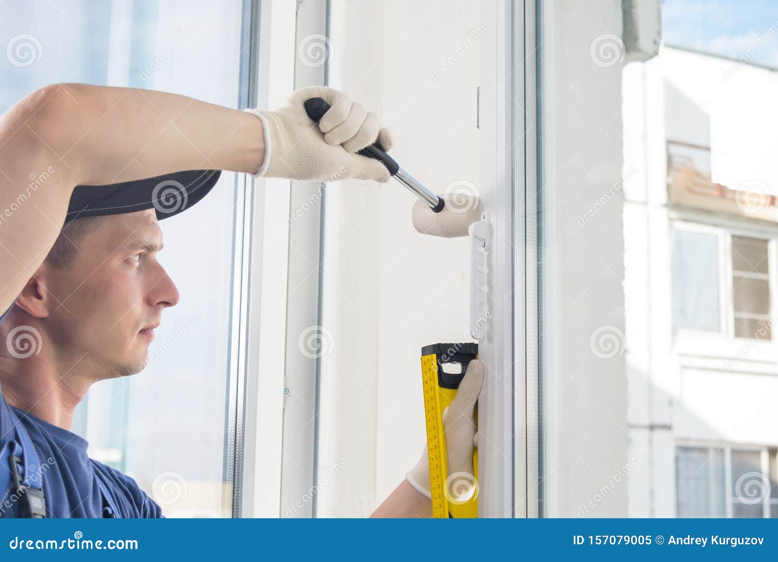 The Master Aligns the Plastic Window with a Rubber Mallet and a Special ...