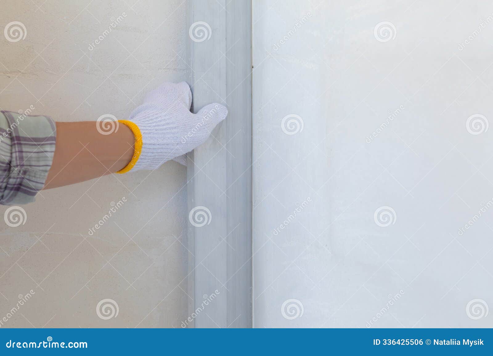 The Master Applies a Rule To Align the Corner of the Wall Stock Photo ...