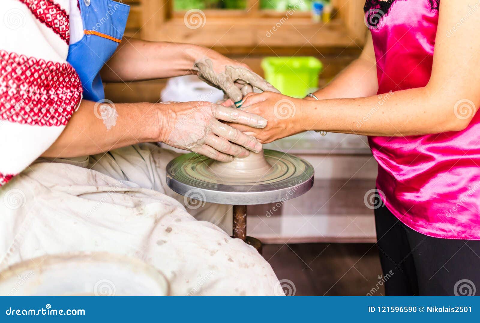 Master and Apprentice Learning Clay Crafting, Potter and Woman Hands ...