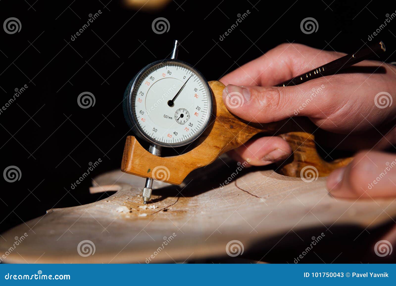Master Artisan Luthier Working on the Creation of a Violin. Painstaking ...
