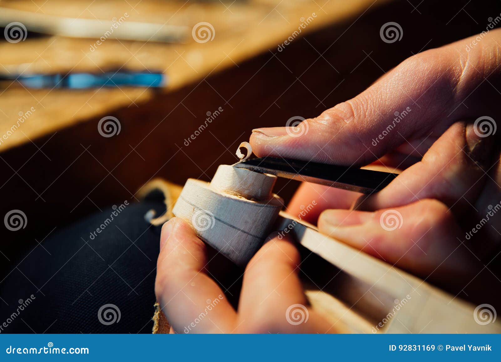 Master Artisan Luthier Working On The Creation Of A Violin. Painstaking ...